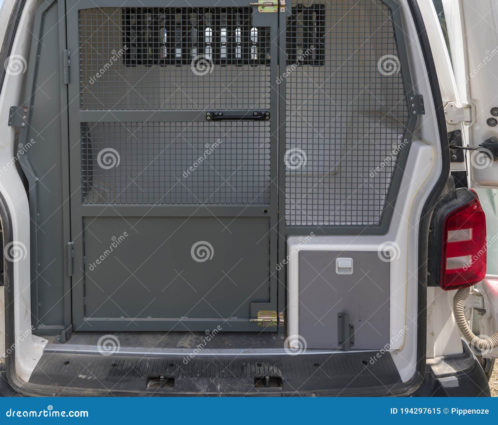 Police Car Inside Cage