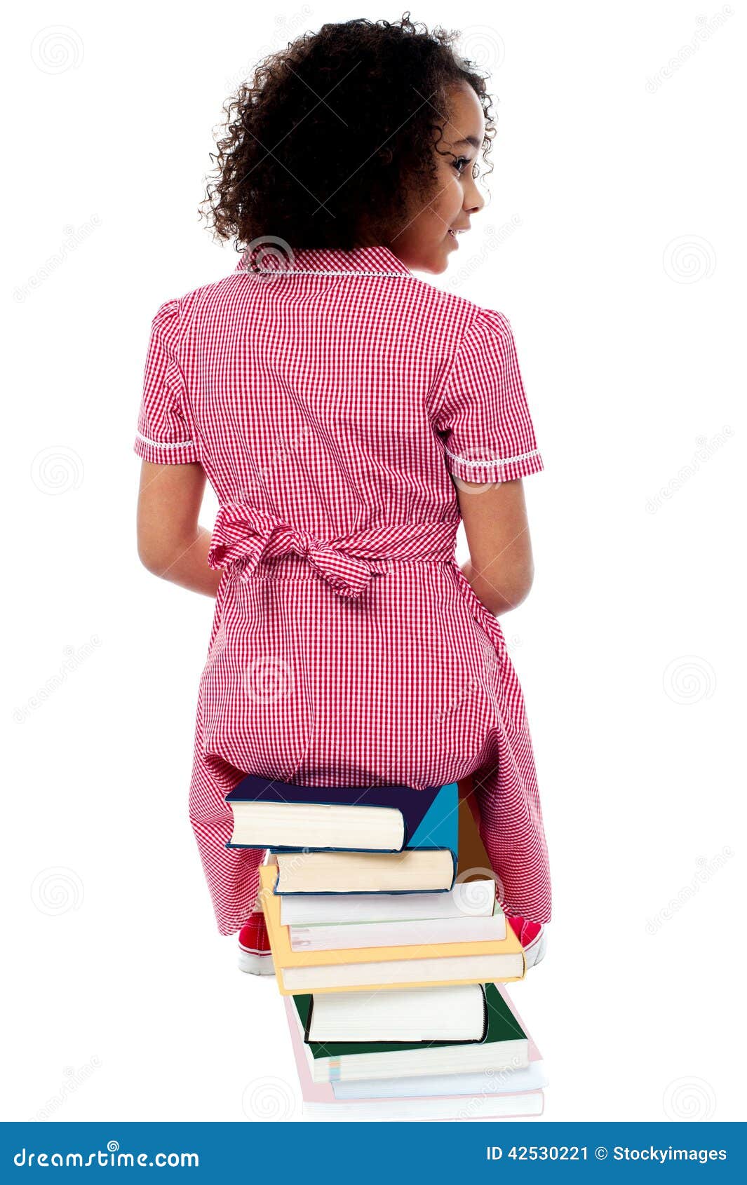 Back Pose of a Girl Sitting on a Pile of Books Stock Image - Image of ...