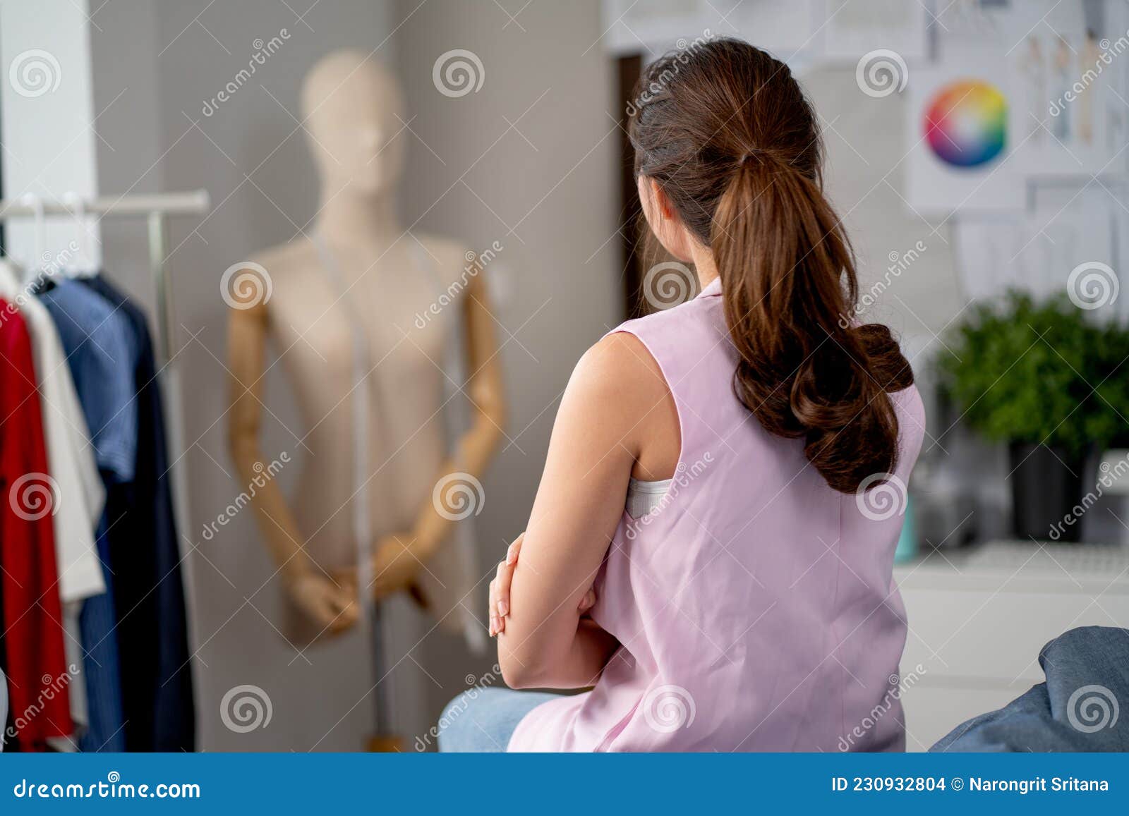 Back of Professional Designer or Tailor Look at Clothes Mannequin and ...