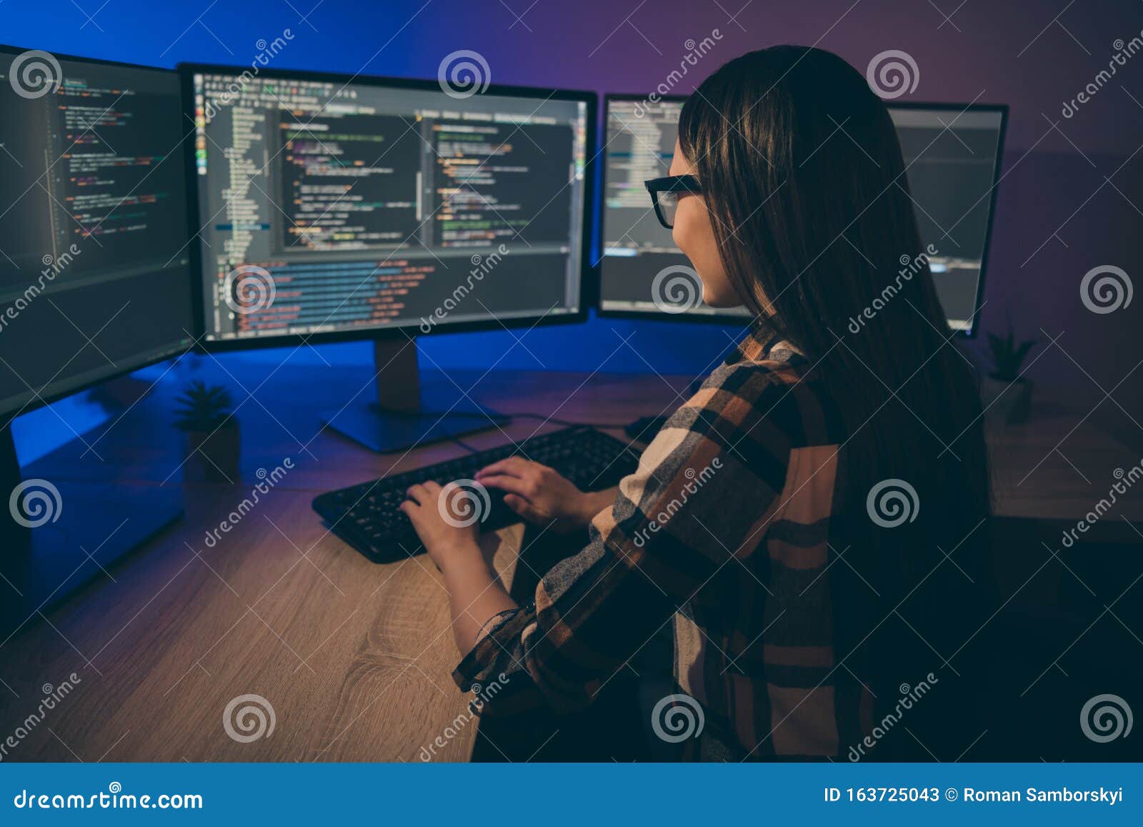 Back Rear View Photo of Programmer Improving Security System of Her ... Back Rear View Photo of Programmer Improving Security System of Her ...
