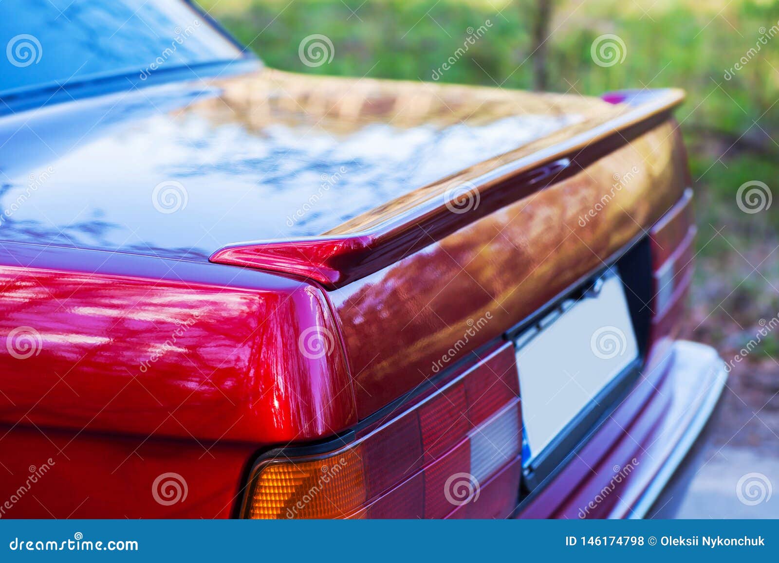 The Back of a Red Retro Car with a Small Wing Stock Photo - Image of ...