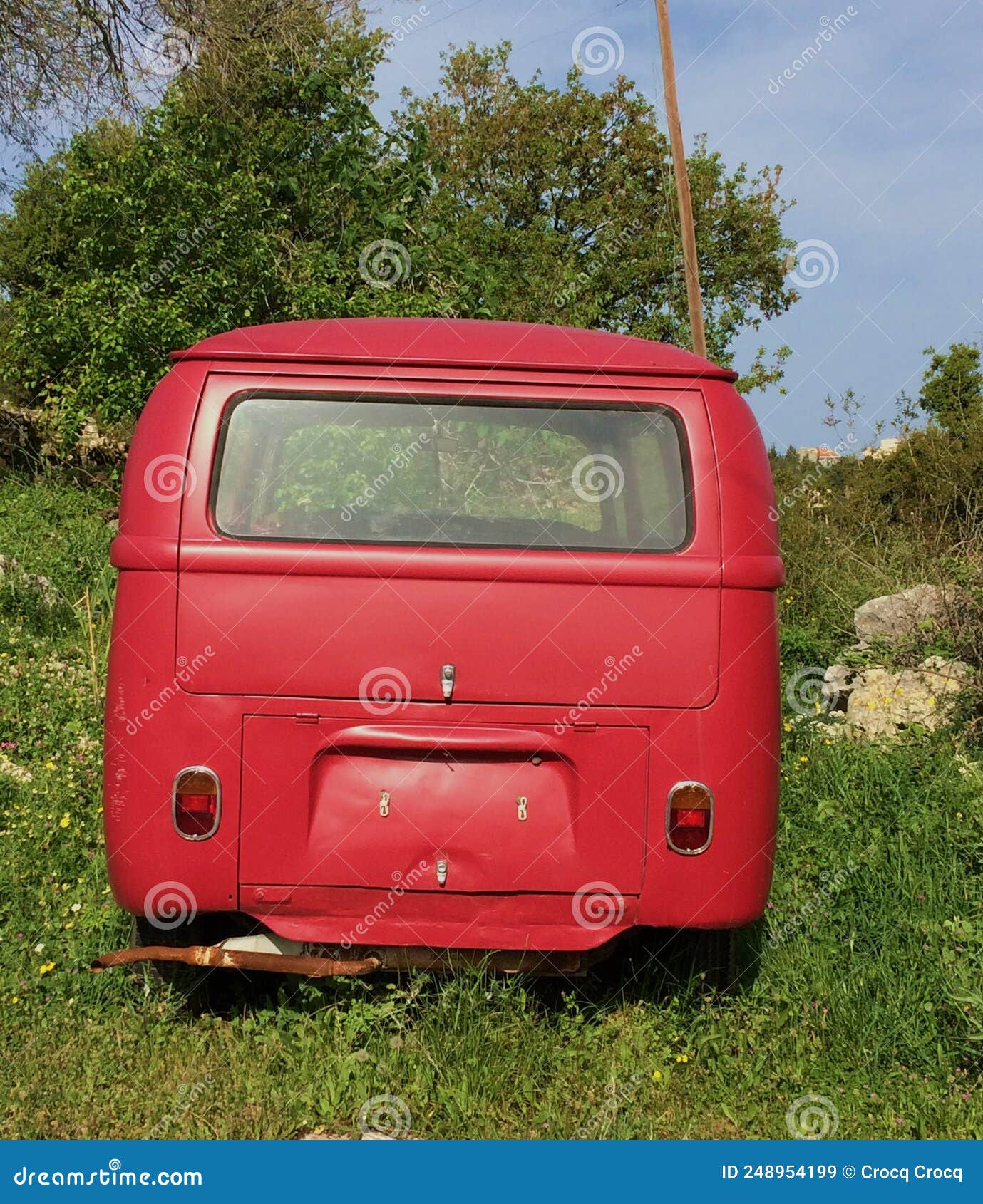 Back of a Red Volkswagen Van in a Green Garden Stock Image - Image of ...
