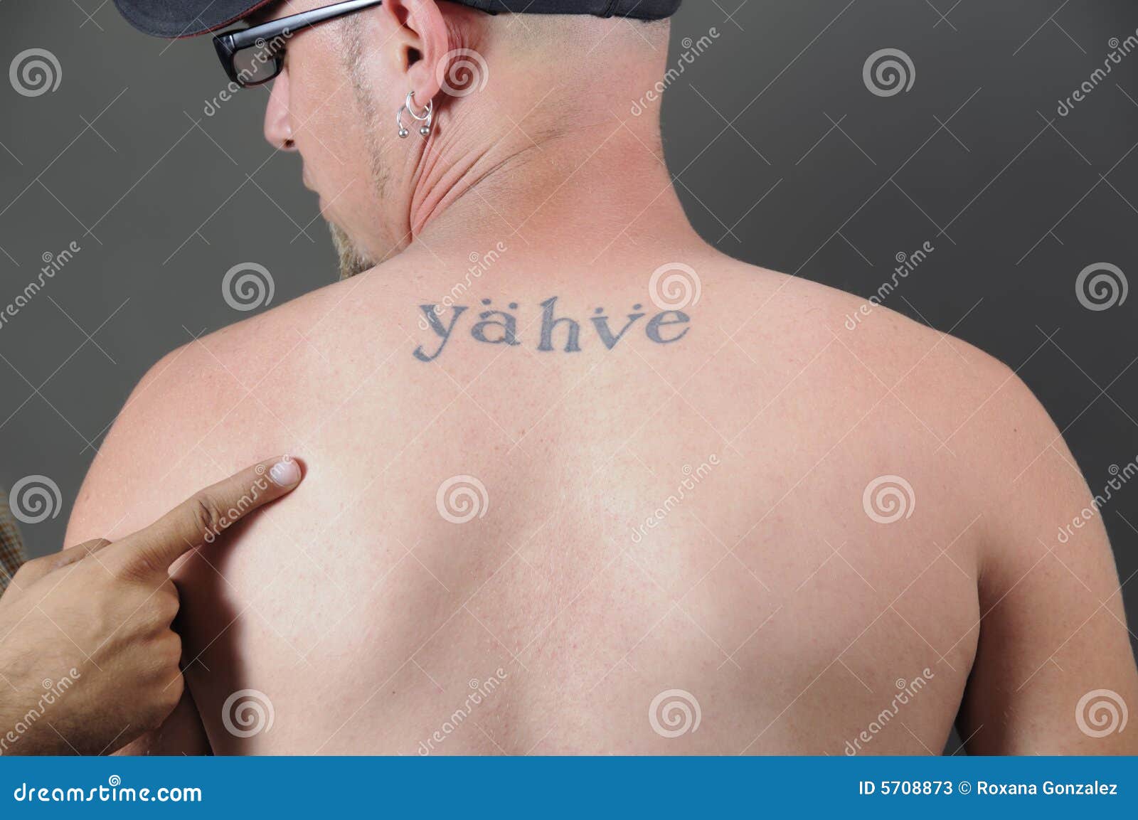 Back religious tattoo stock image. Image of back, sign - 5708873