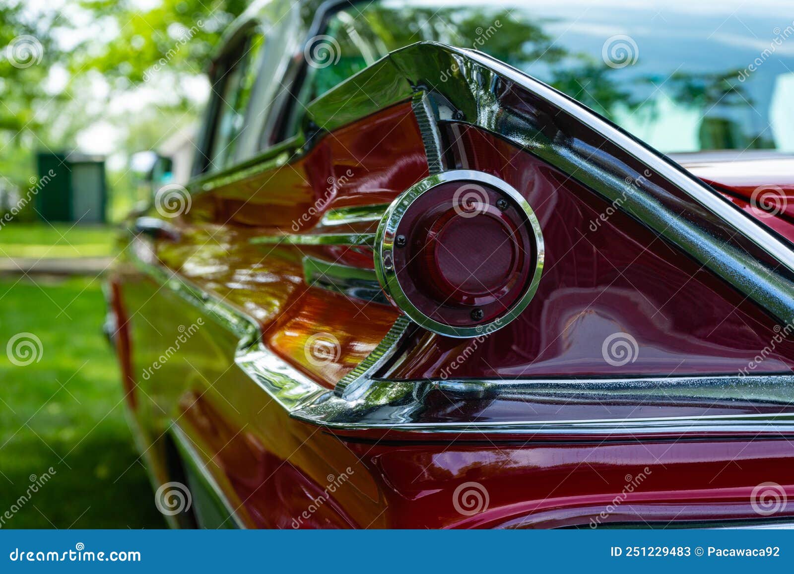 The Back of a Retro Car from the 60s. Rear Wing Tail Unit of Red Color ...