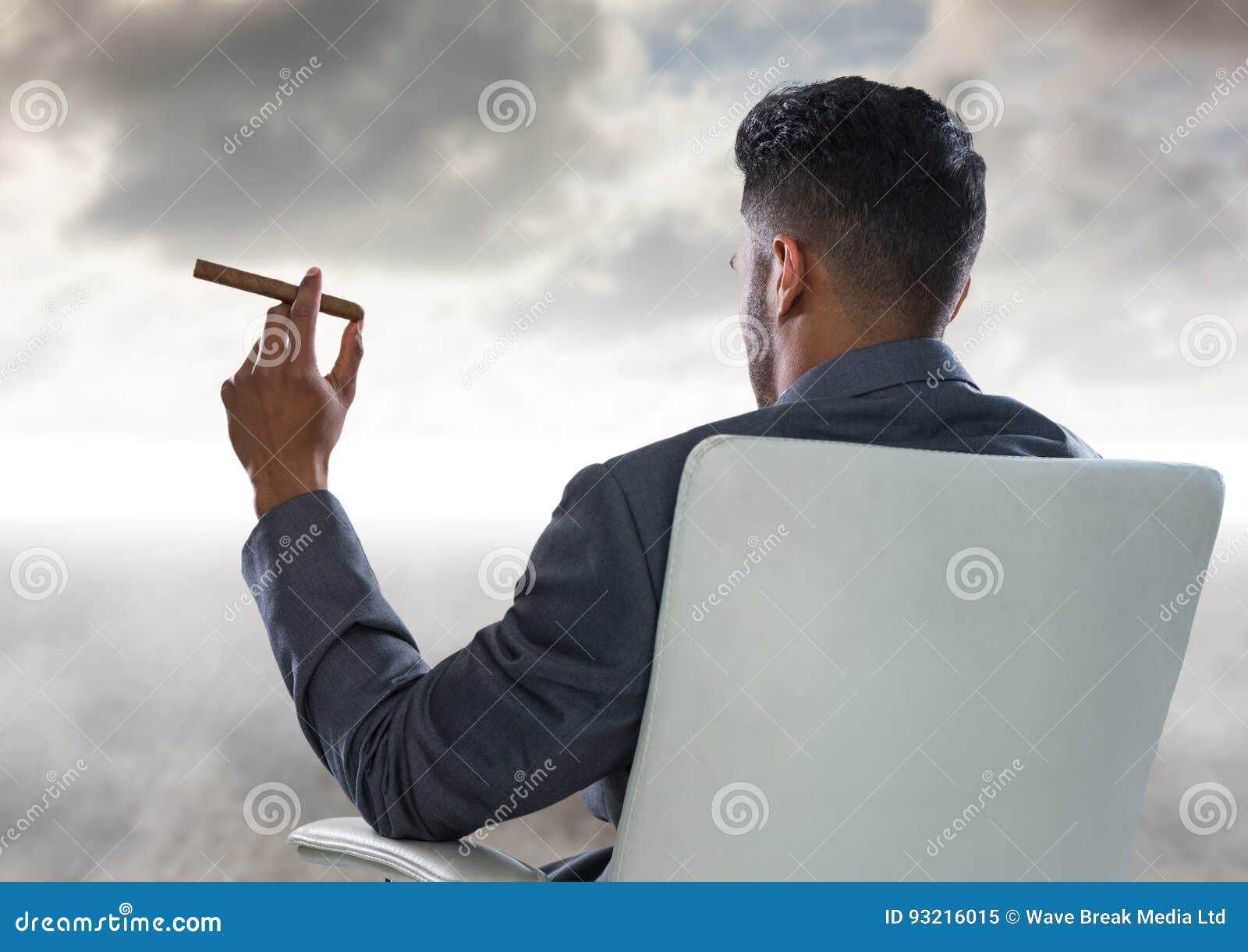 Back of Seated Business Man Smoking Cigar and Looking at Clouds Stock ...