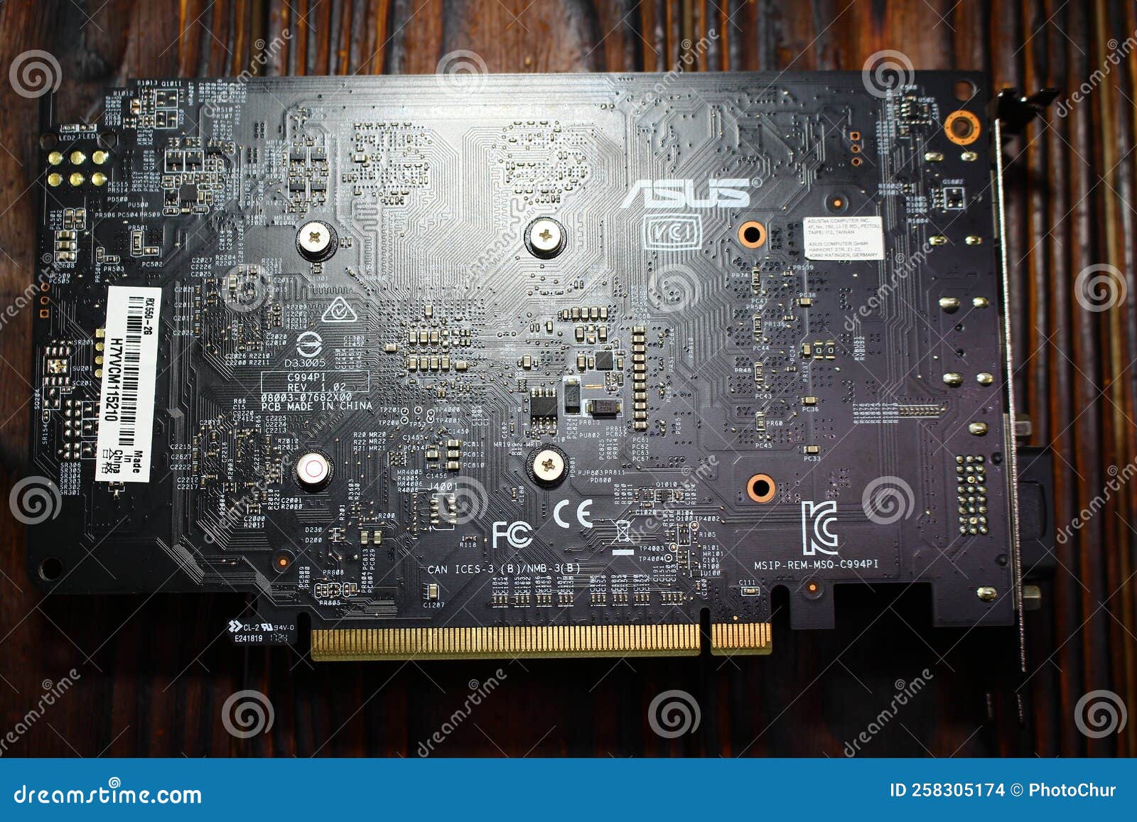 The Back Side of the Asus AMD Radeon RX550 Graphics Card Lying on the ...