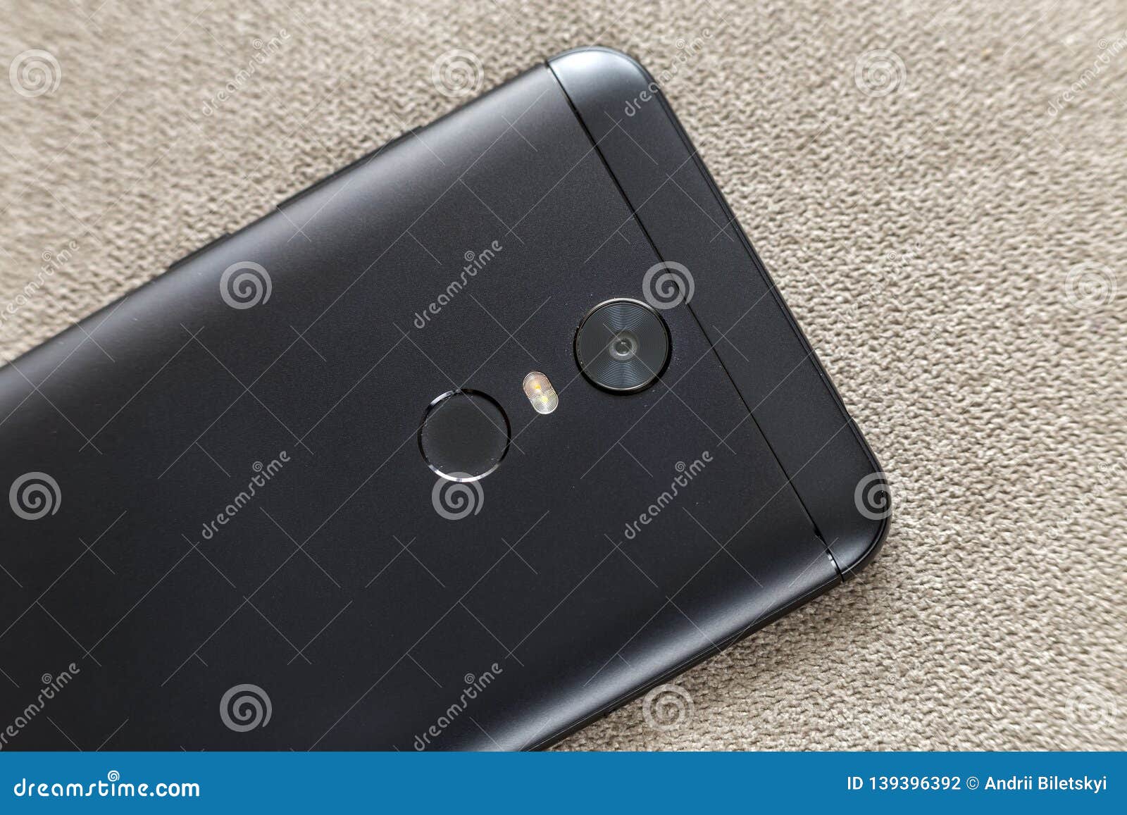 Back Side of Black Cellphone Isolated with Security Thumb Fingerprint ...