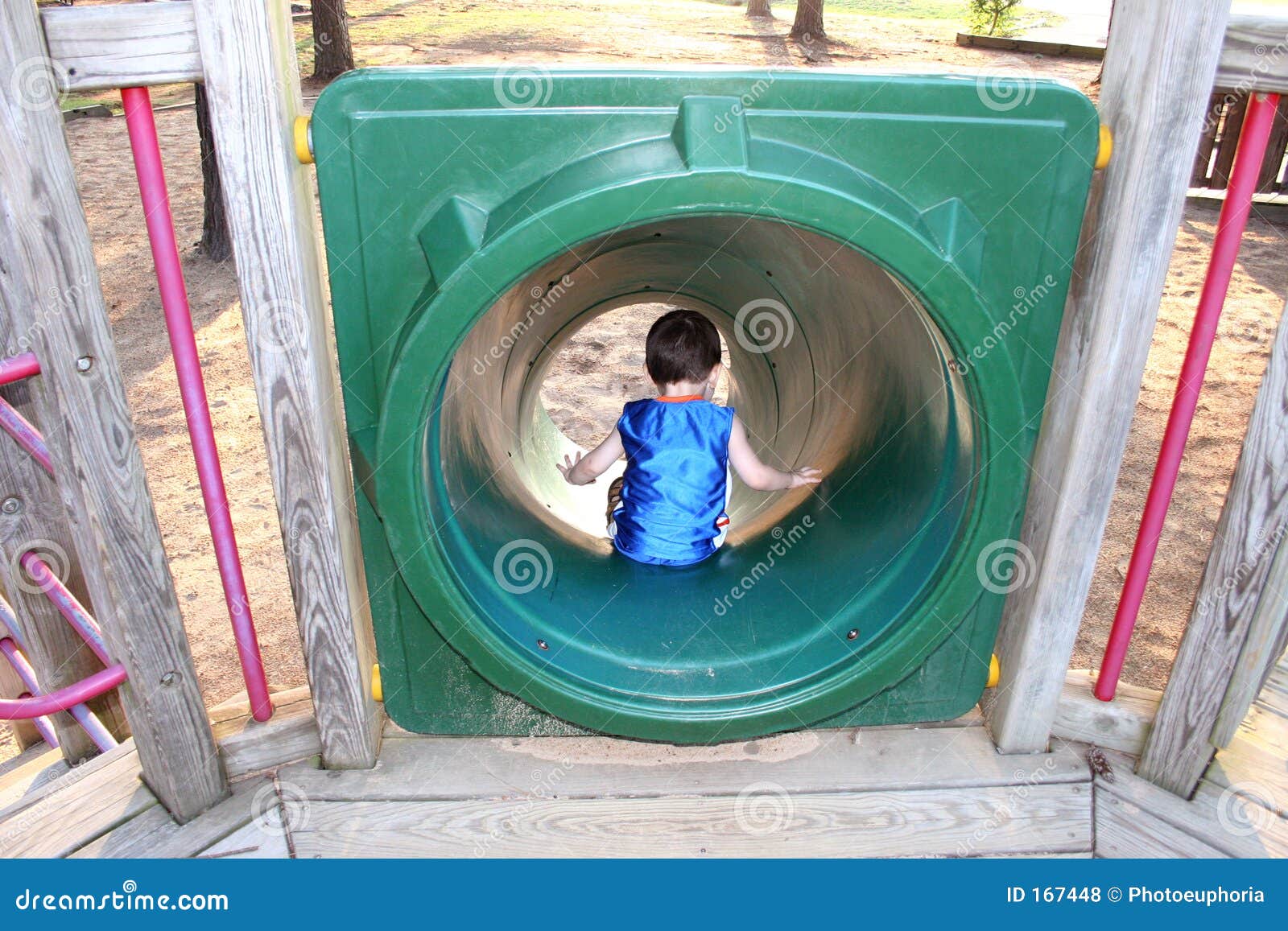 Back Side of Boy Going Down Park Slide Stock Photo - Image of happiness ...