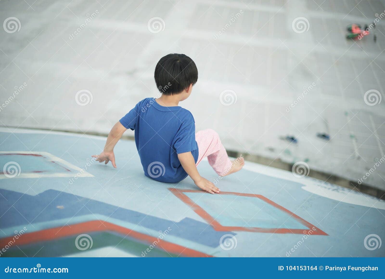 Back Side of Boy Going Down Park Slide Stock Photo - Image of happiness ...
