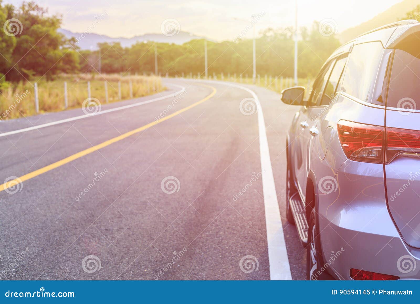 Back Side of New Silver SUV Car Parking on the Asphalt Road Stock Image ...