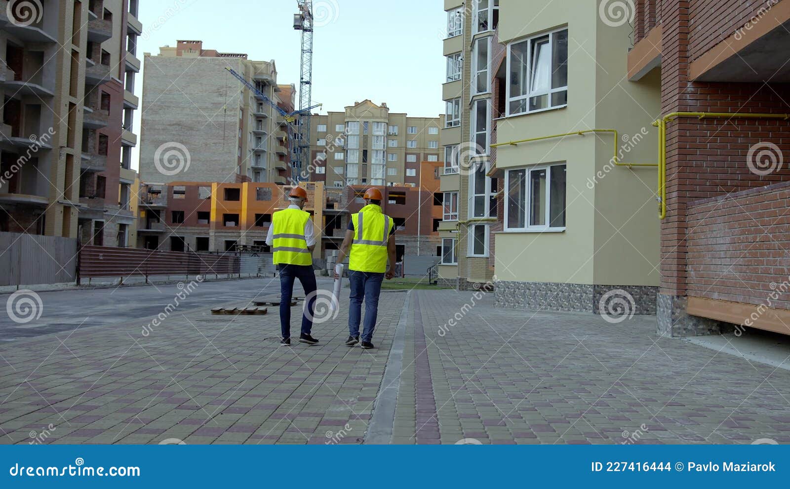 Back View of Young Builders on Their Work Stock Footage - Video of ...