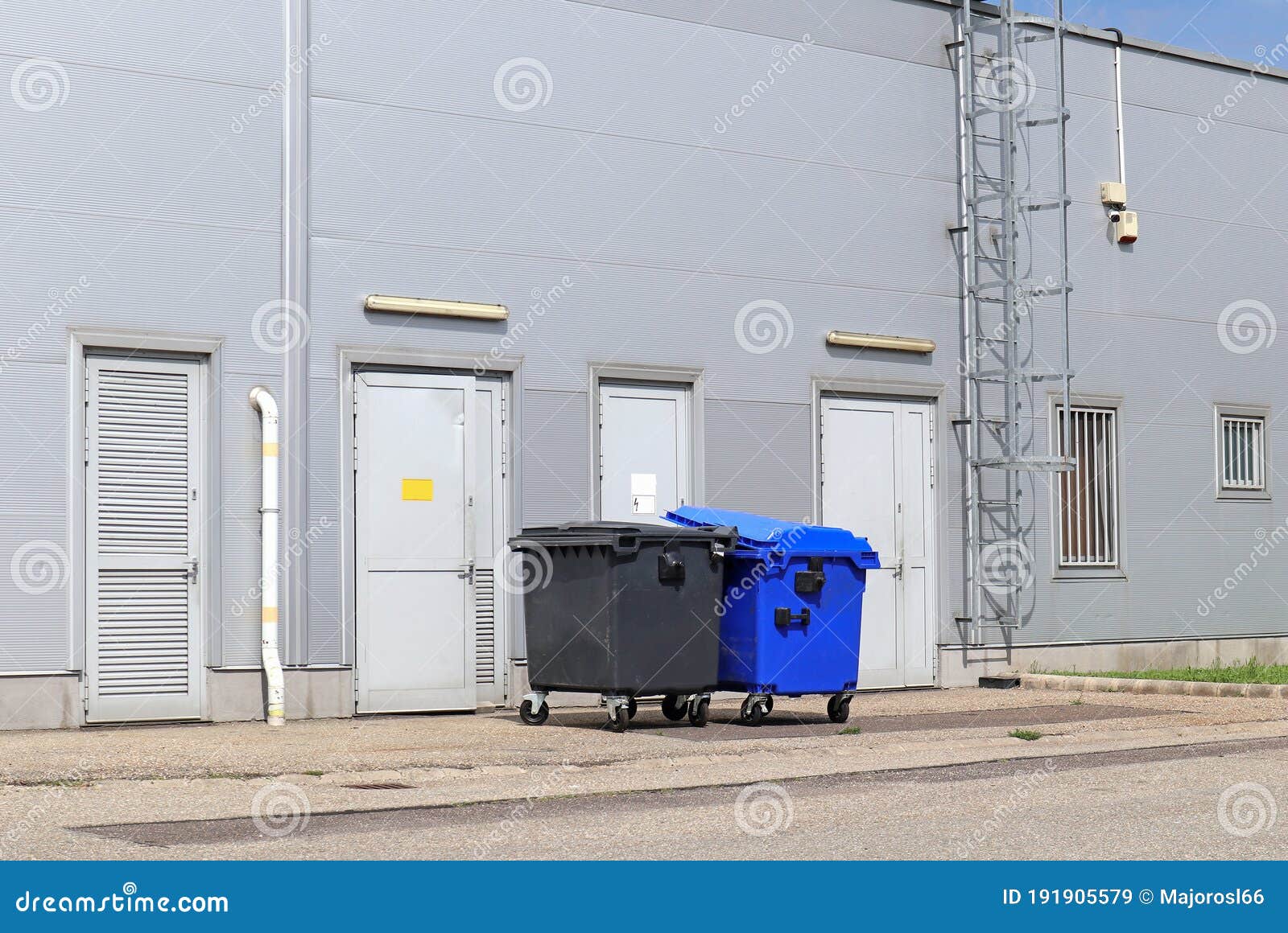 Back Side of the Warehouse Building with Garbage Cans Stock Image ...