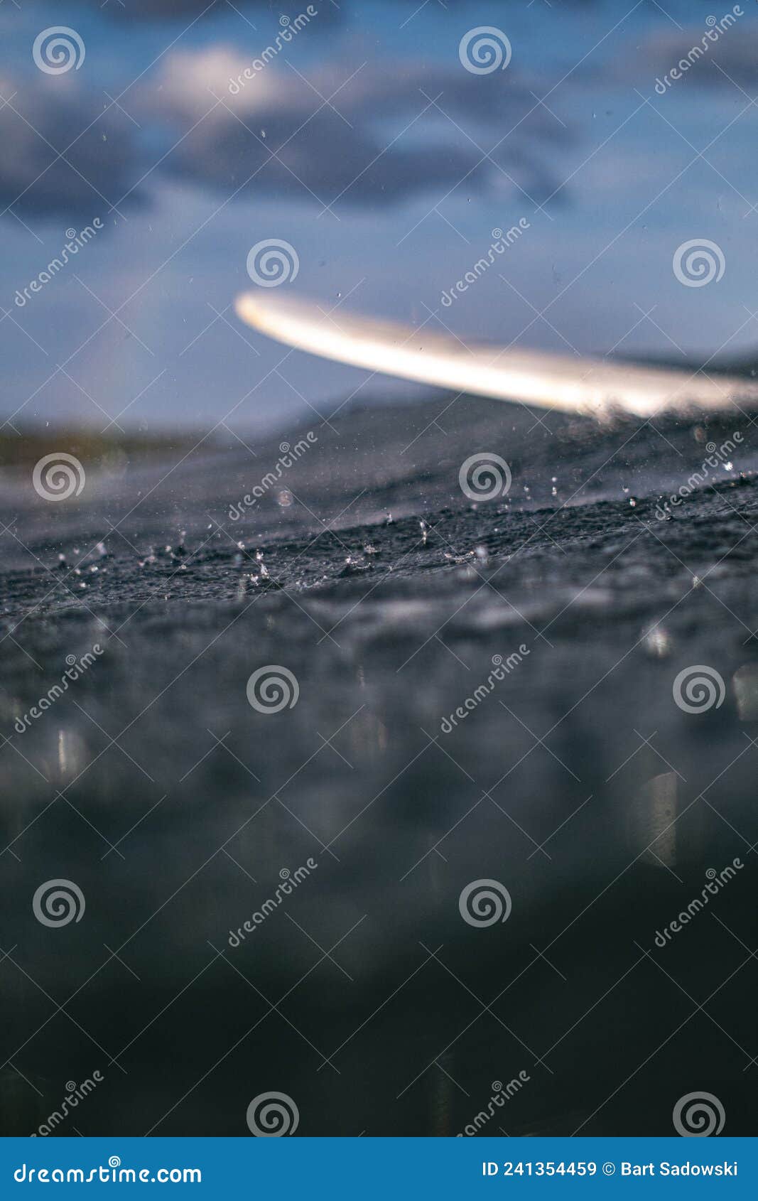 On the back side of a wave stock image. Image of surfing - 241354459