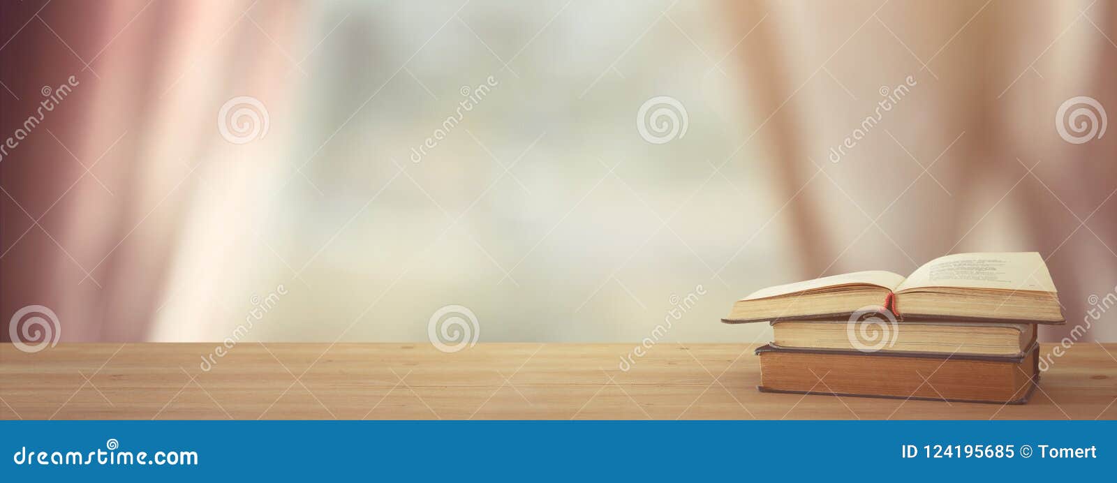 Back To School Concept. Stack of Books Over Wooden Desk in Front of Day ...