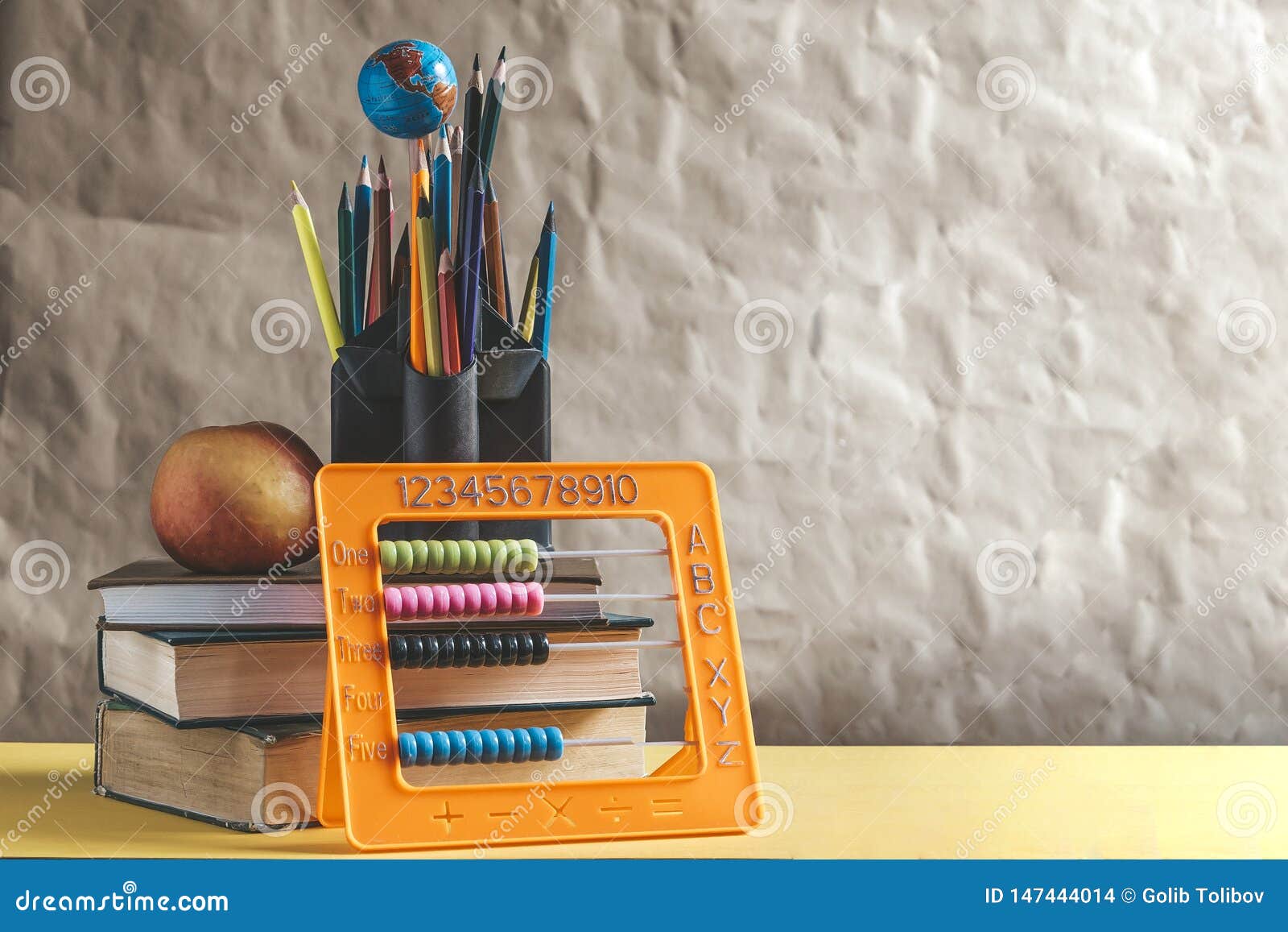 Back To School Concept. Stack of Books with School Supplies Stock Photo ...