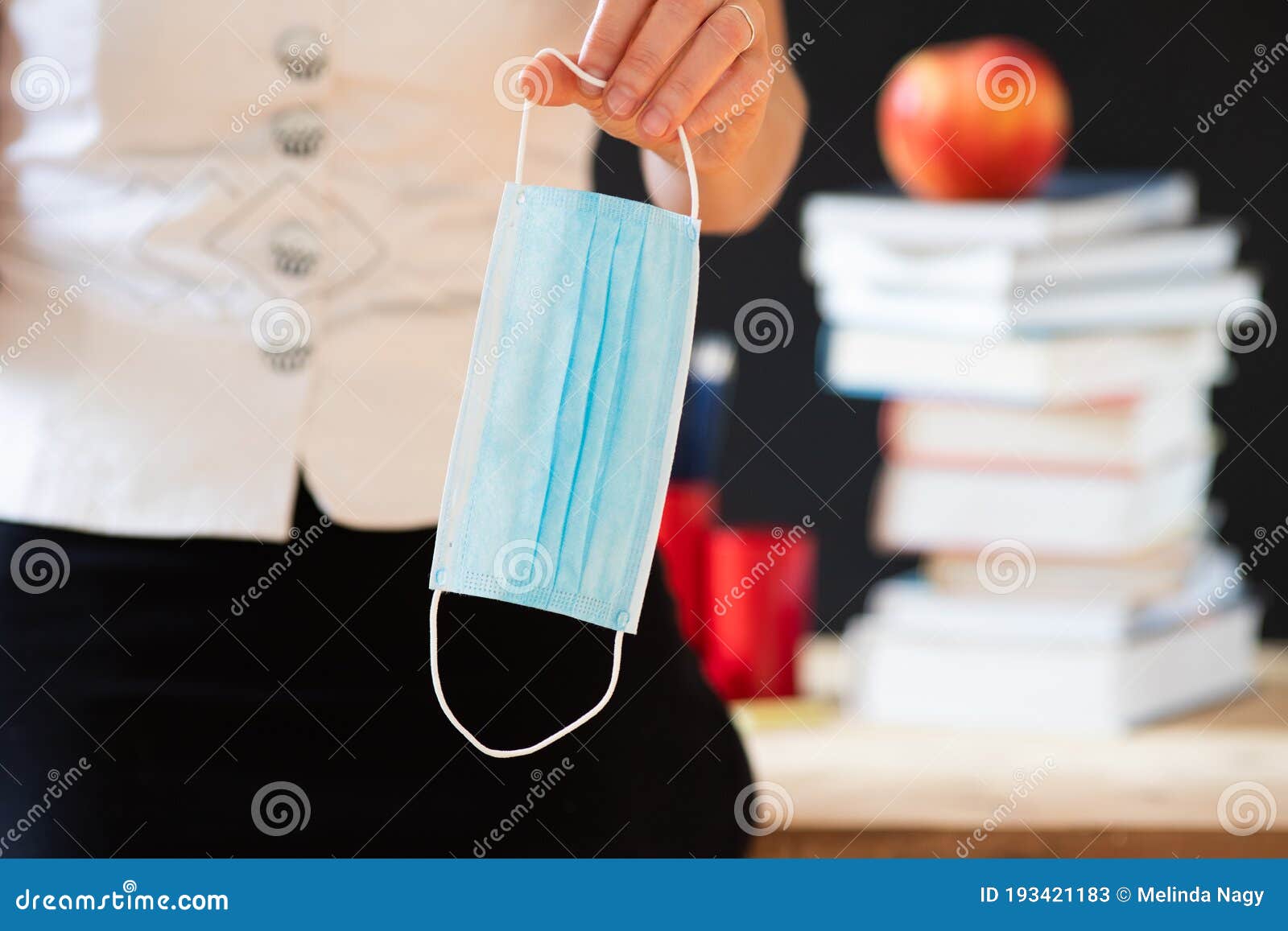 Back To School during Covid Pandemics Teacher with Face Mask Stock ...