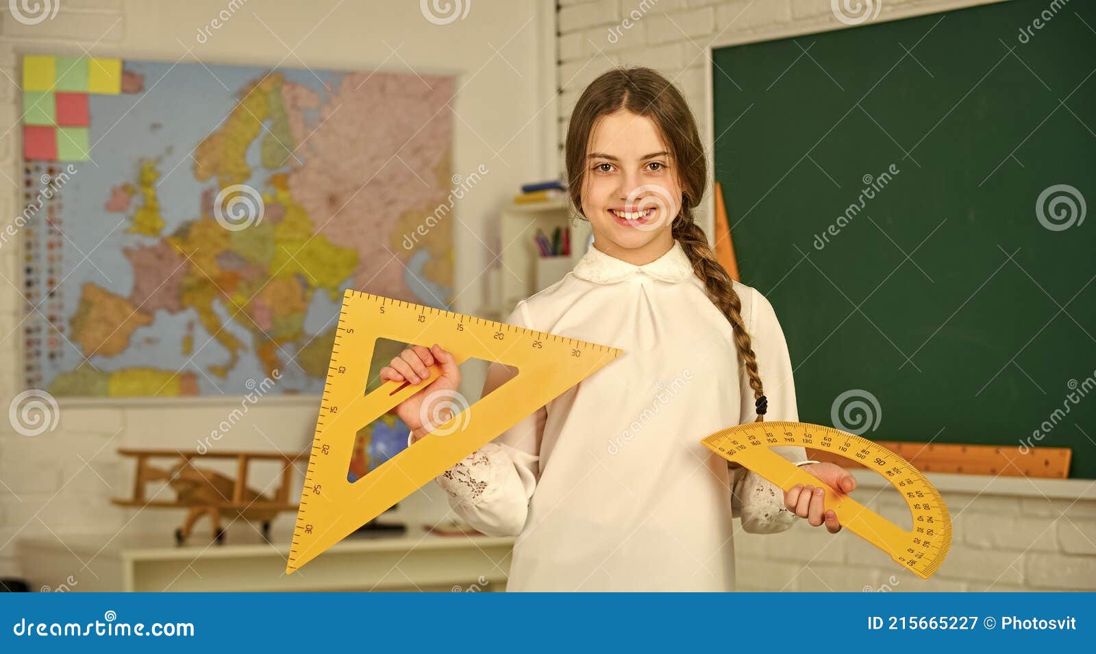 Back To School. High School Student Learning Geometry in Class. Measure ...