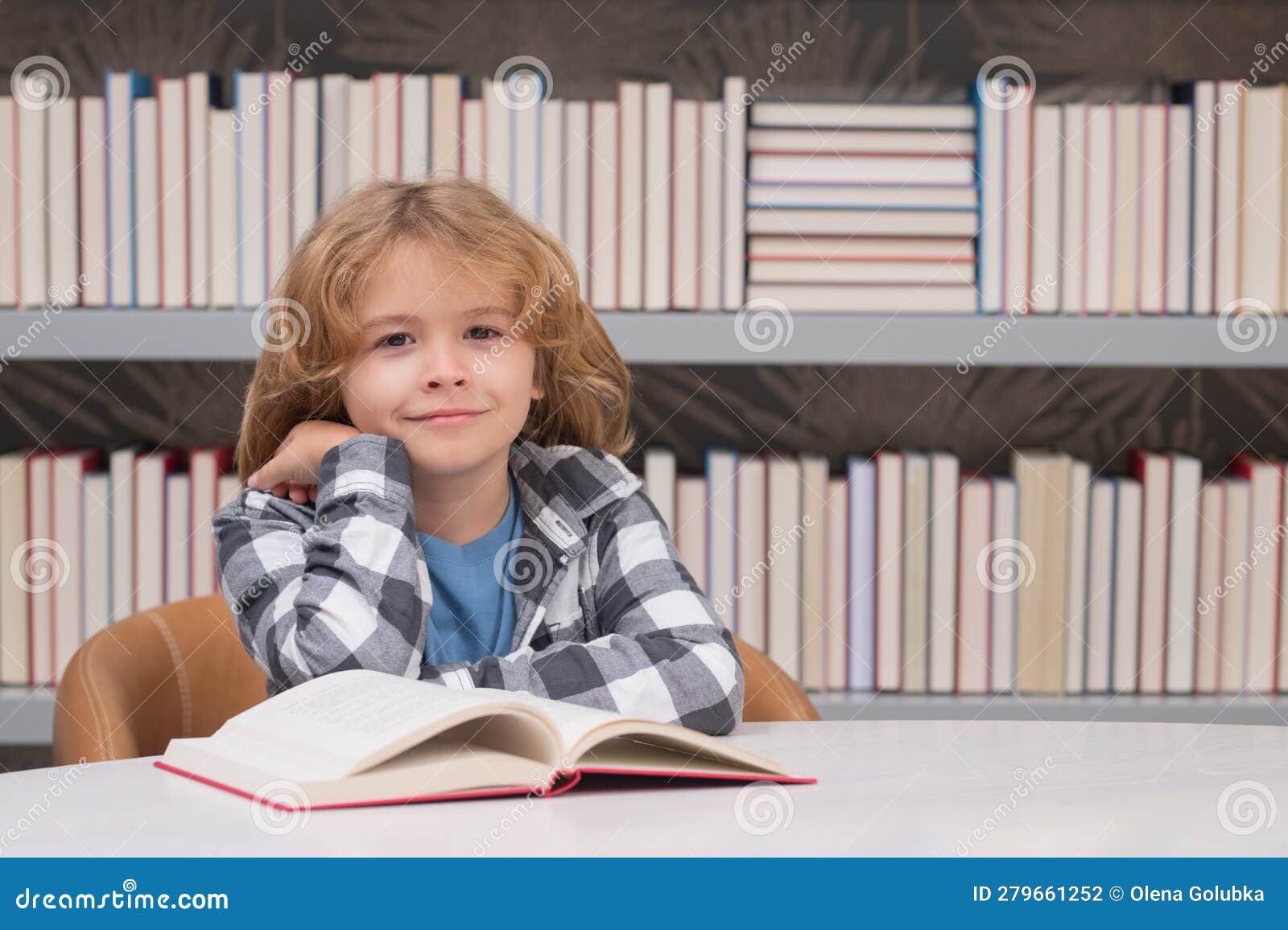 Back To School. Kid Reading Book in a Book Store or Library, Stock ...