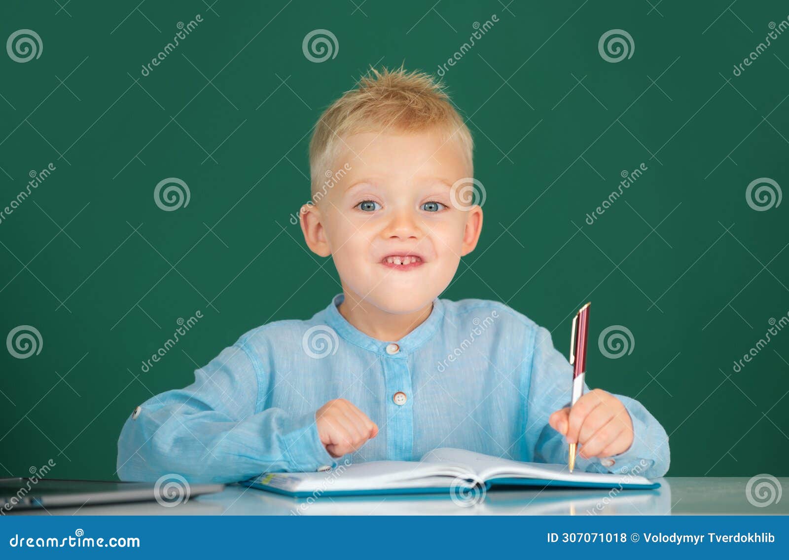 Back To School. Kid Writing in Class. Little Student Child Studying in ...