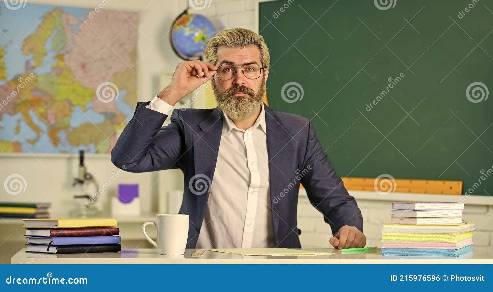 Back To School. Knowledge Day. Man School Teacher Sit in Classroom ...