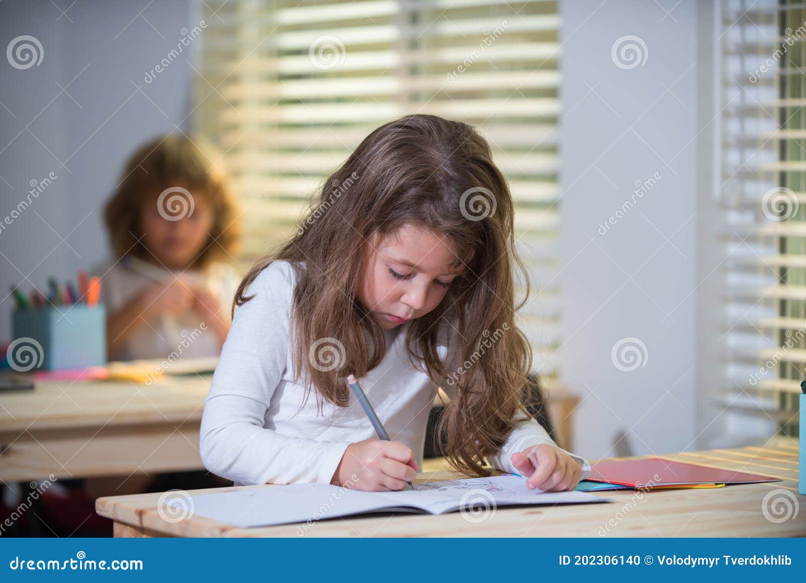 Back To School. Portrait of Happy School Children Drawing. Stock Photo ...