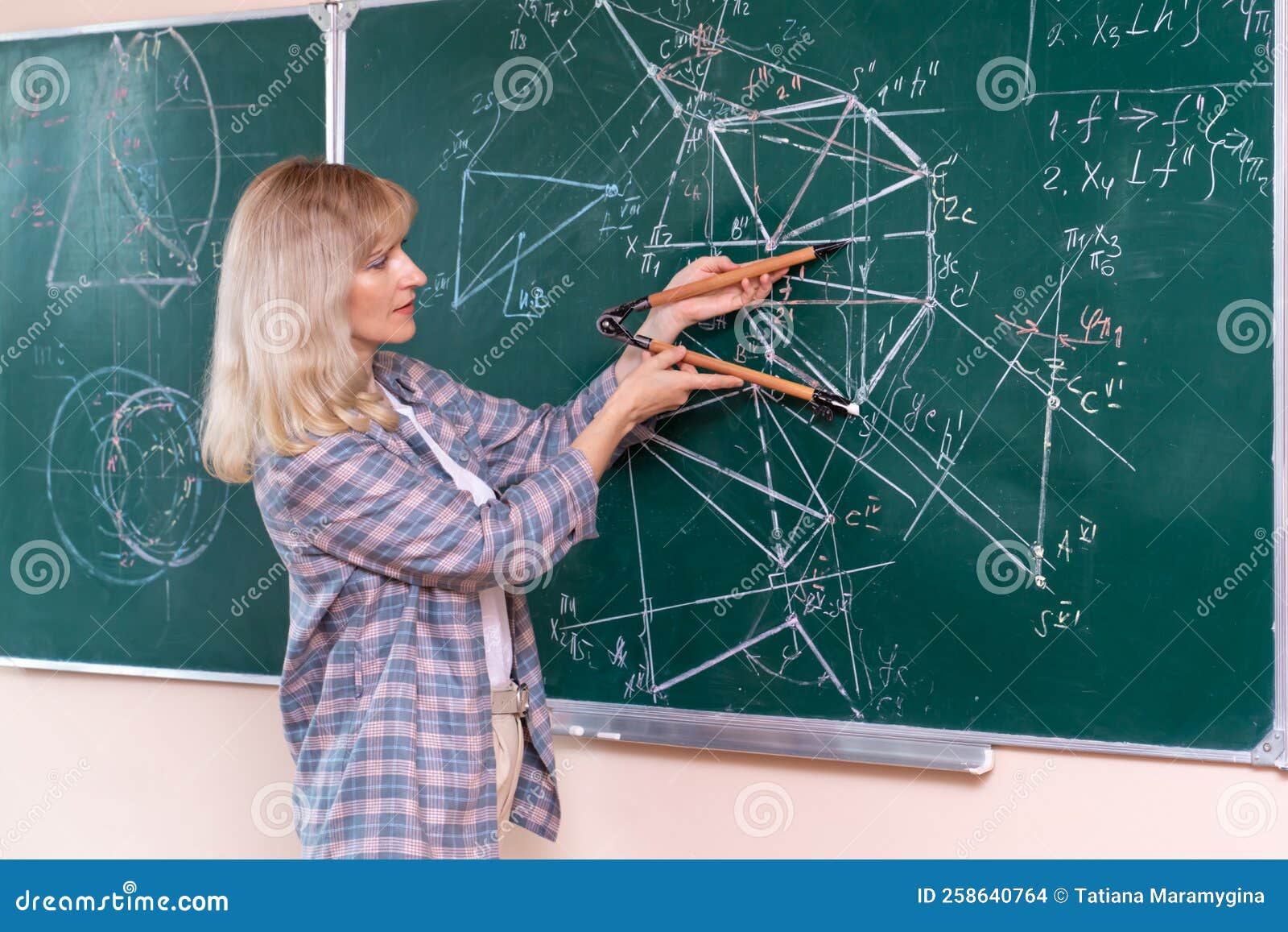 Back To School. the Professor Solves the Problem at the Blackboard ...