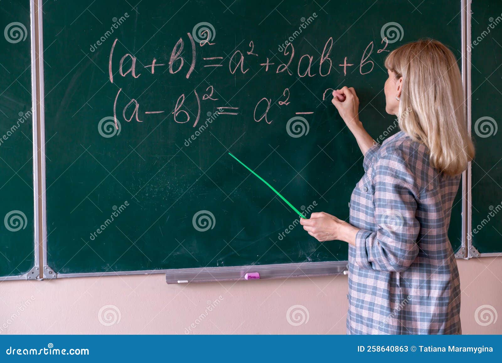 Back To School. the Professor Solves the Problem at the Blackboard ...