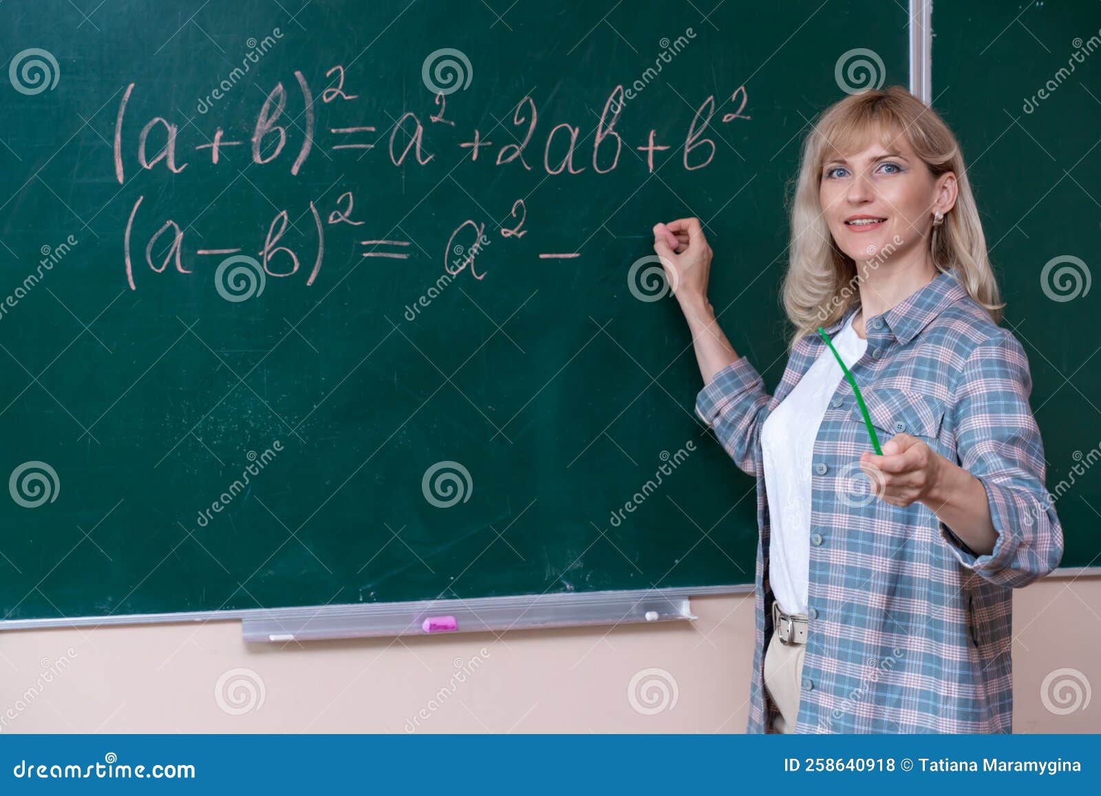Back To School. the Professor Solves the Problem at the Blackboard ...