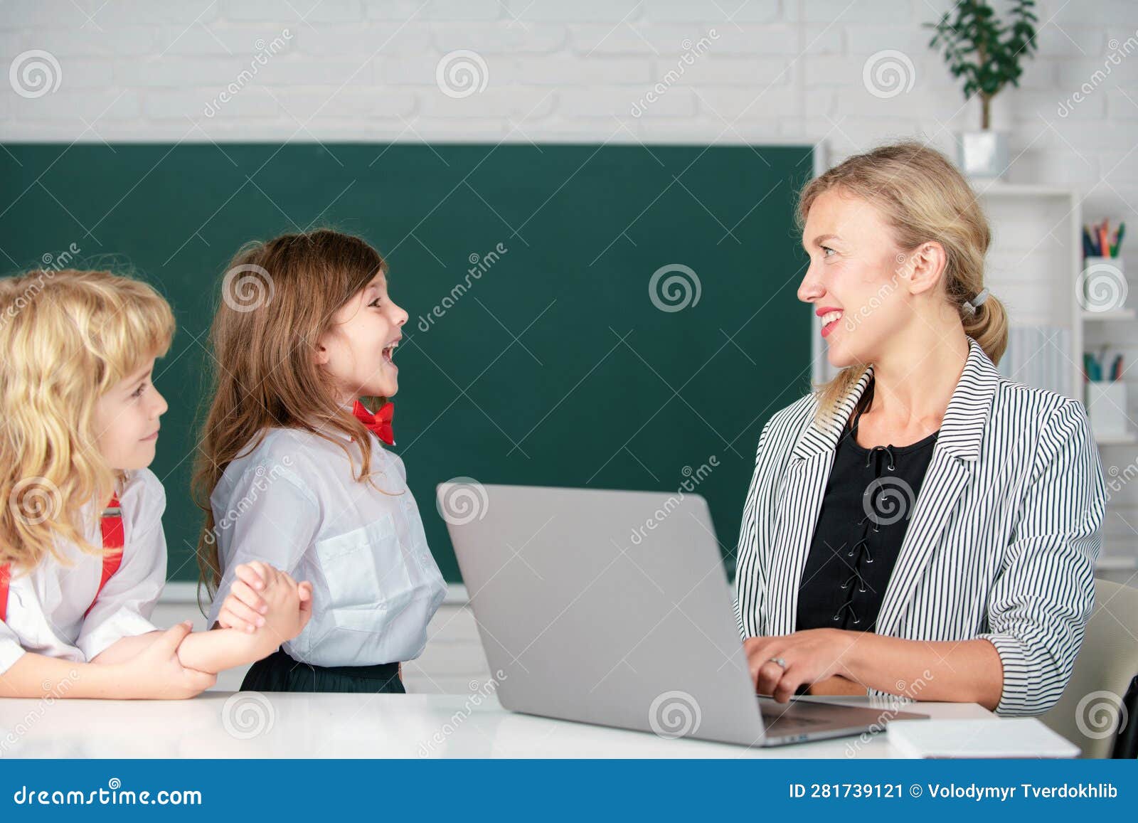 Back To School. School Pupil with Teacher Learning at Laptop Computer ...