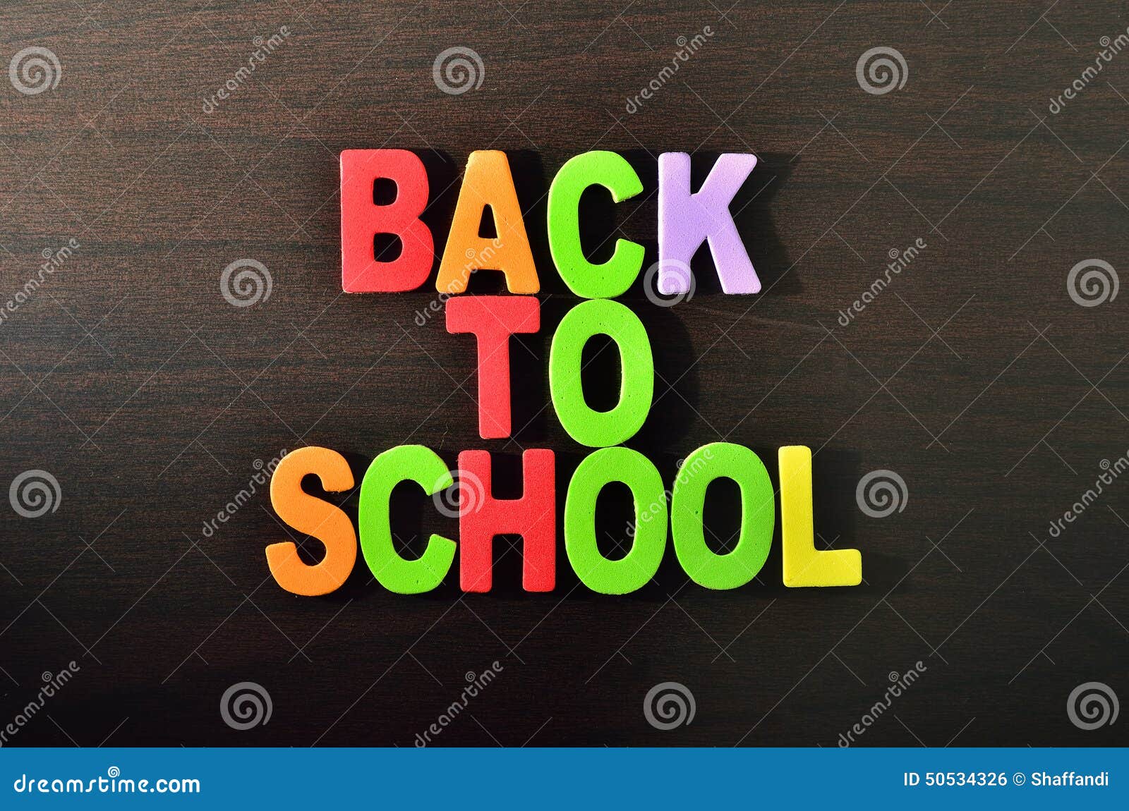 Back To School Text with Shadow on Wooden Background Stock Photo ...
