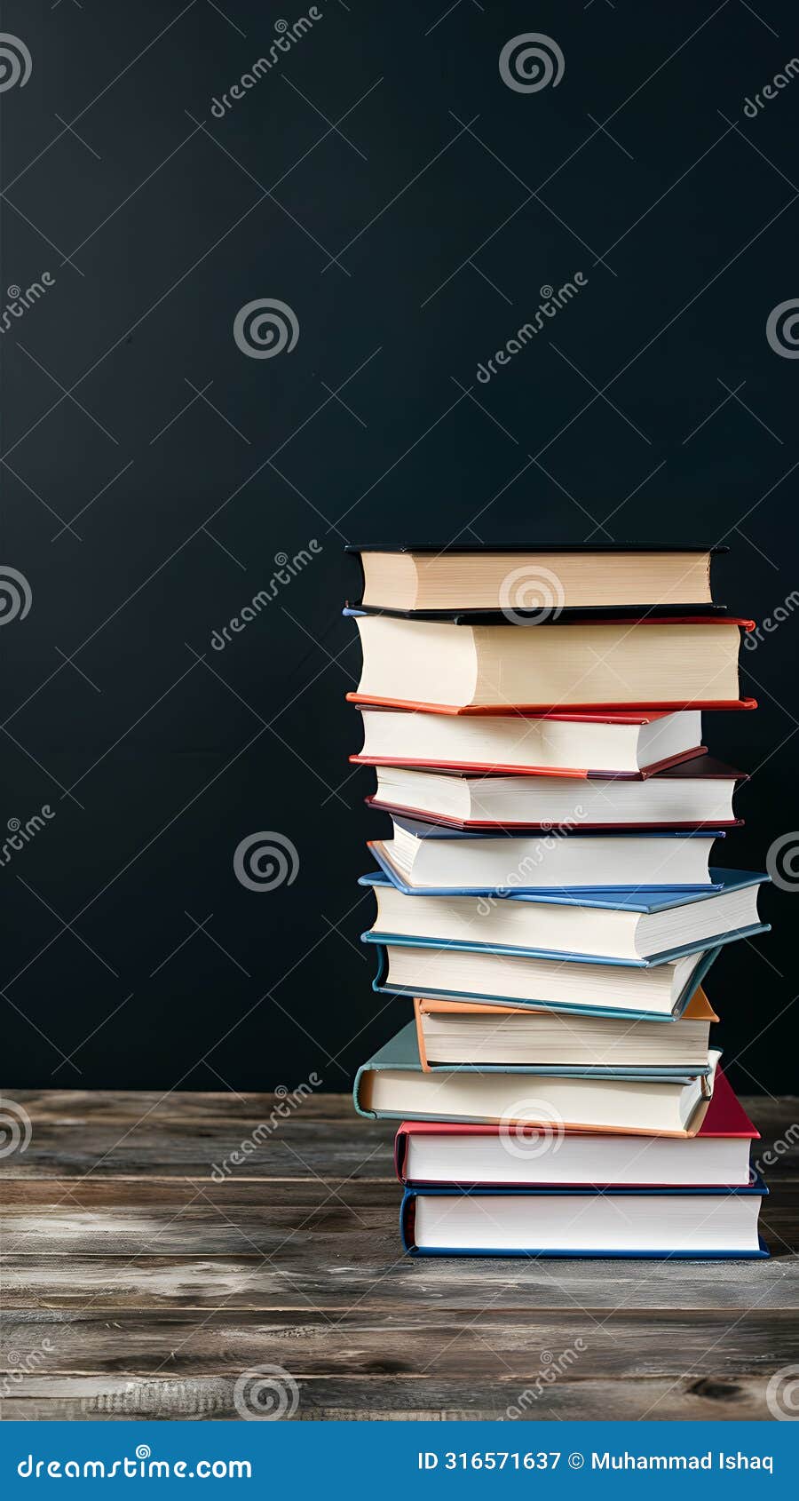 Back To School Theme Stack of Books Against Dark Background Stock ...