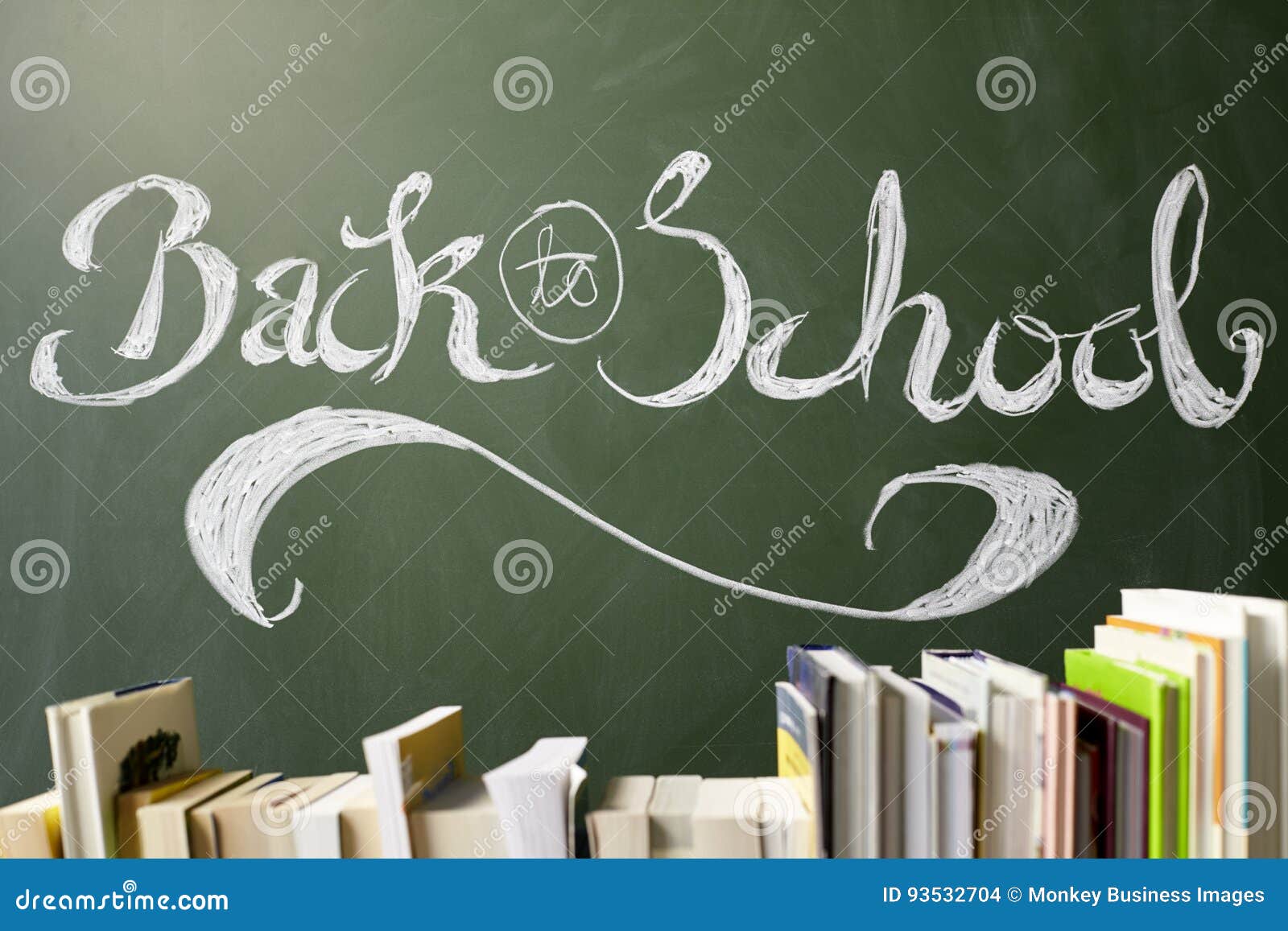Back To School Written on Chalkboard, Books in Foreground Stock Photo ...