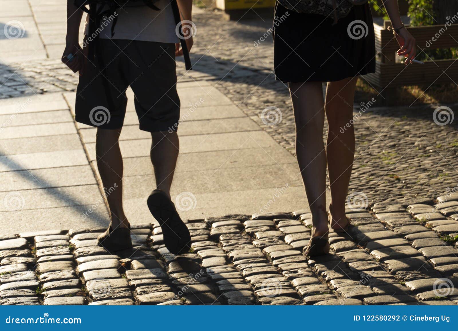 Back turned people walking stock photo. Image of female - 122580292