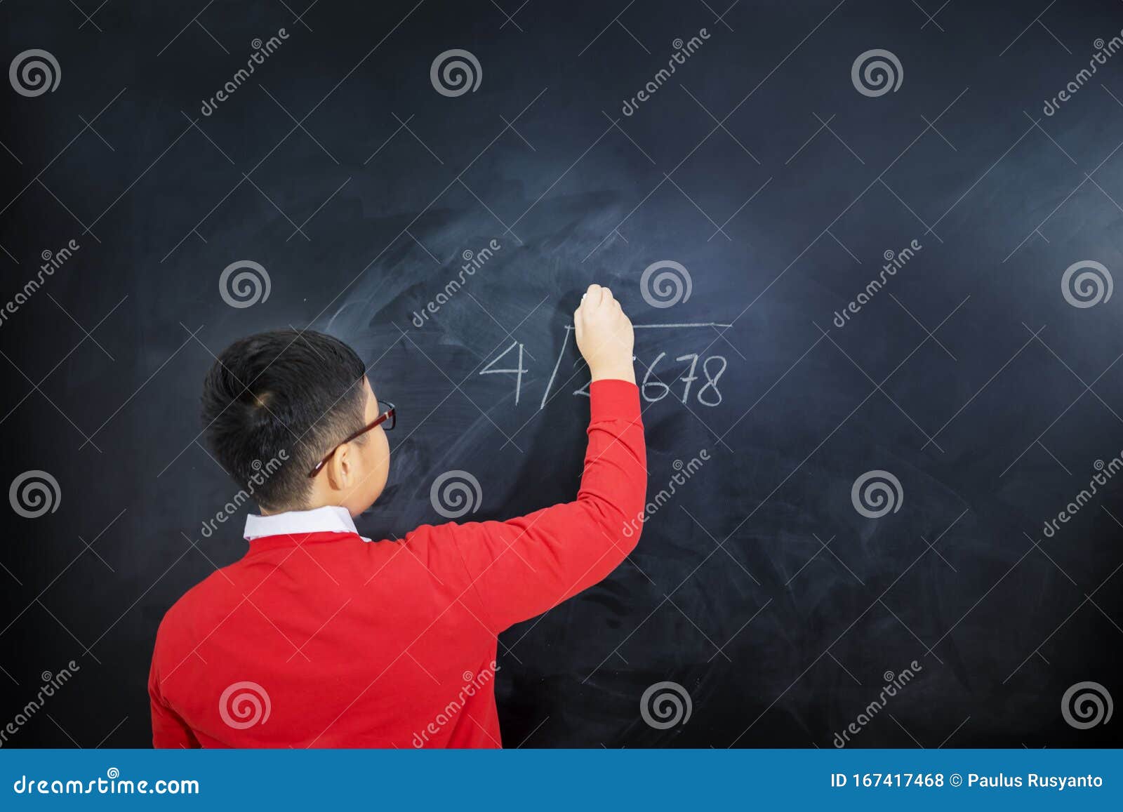 Back View of an Adorable Boy Solving Calculations Stock Photo - Image ...