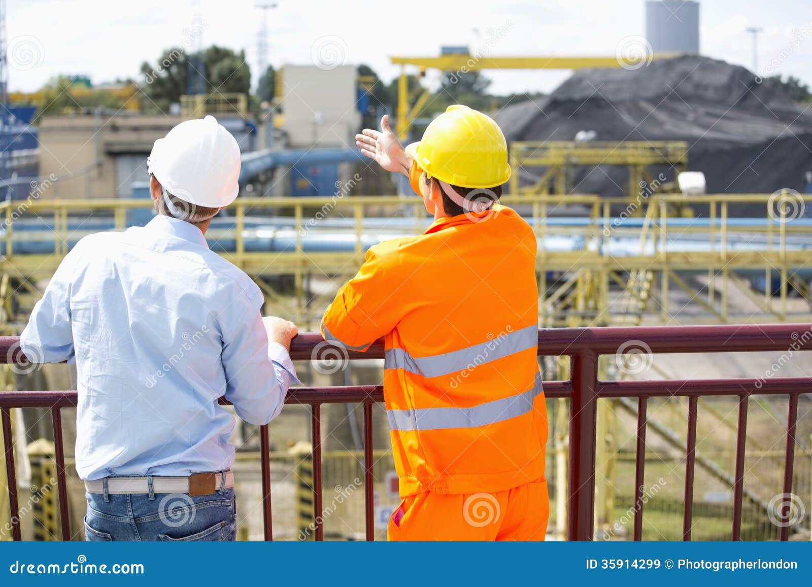 Back View of Architects Inspecting Construction Site Stock Image ...