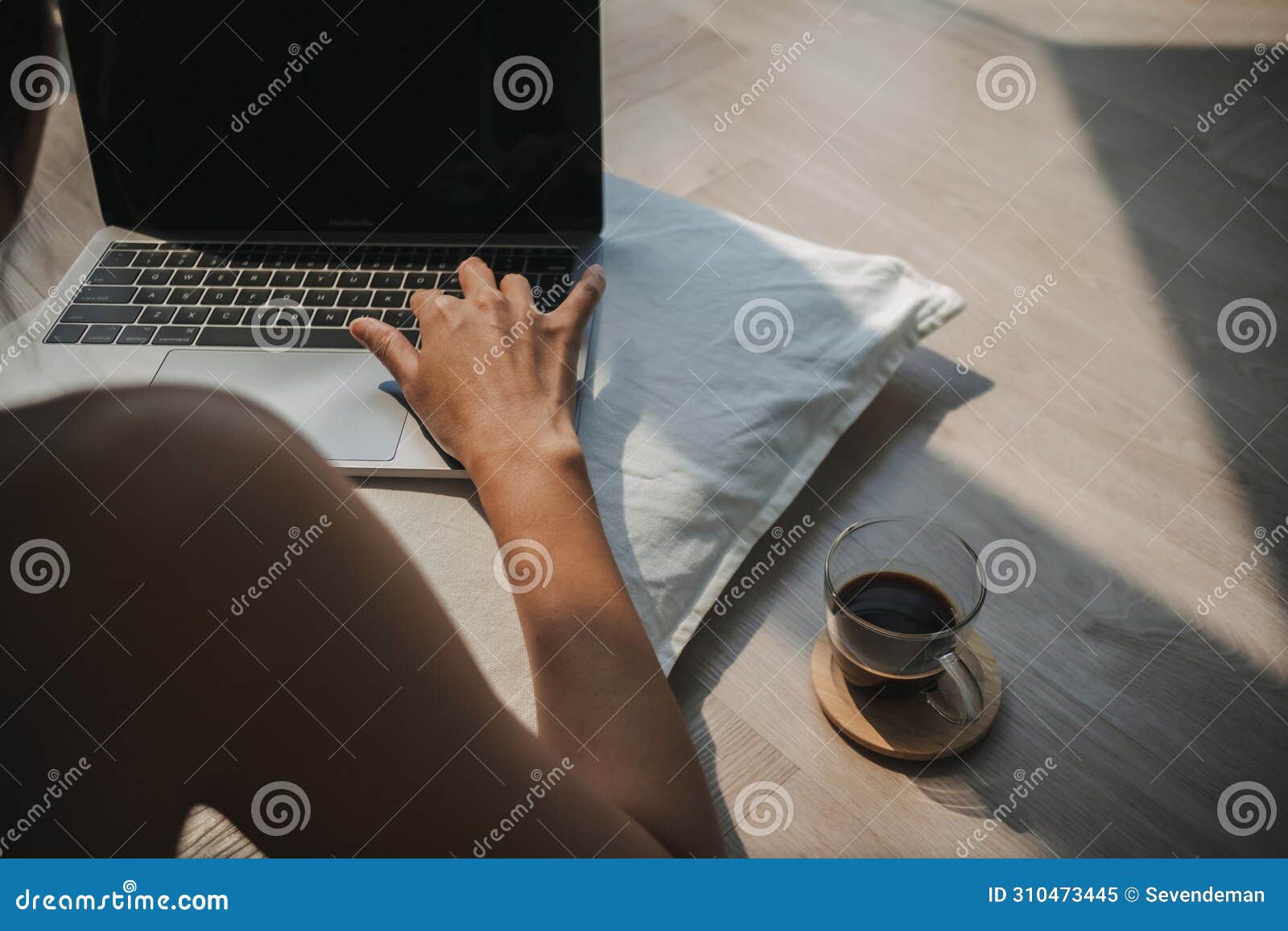 Back View of Asian Woman Using Computer, Lying on Floor while Working ...