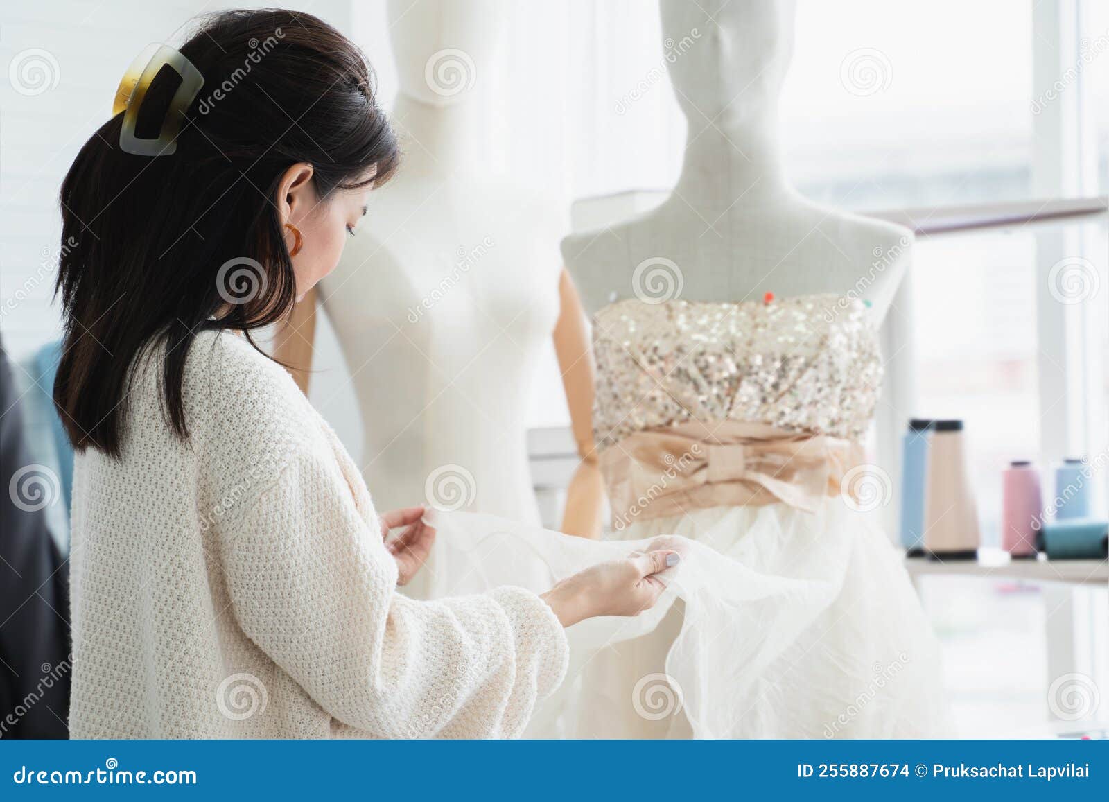 Back View of Attractive 30s Woman Fashion Designer or Dressmaker ... Back View of Attractive 30s Woman Fashion Designer or Dressmaker ...