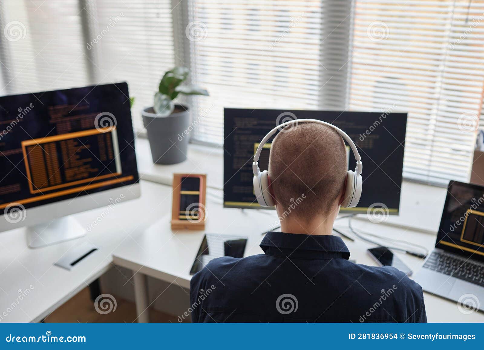 Young Woman As Female Programmer Wearing Headphones Stock Photo - Image ...