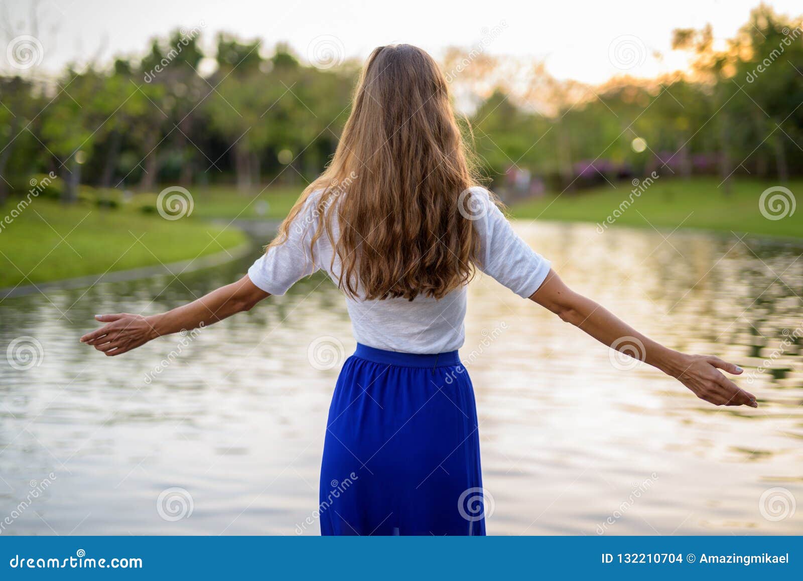 Back View of Beautiful Woman with Long Hair Raising Both Her Arm Stock ... Back View of Beautiful Woman with Long Hair Raising Both Her Arm Stock ...