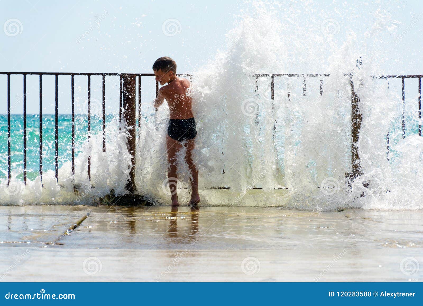 Back View of Boy Standing Against the Sea on the Old Pier. Summer Beach ...