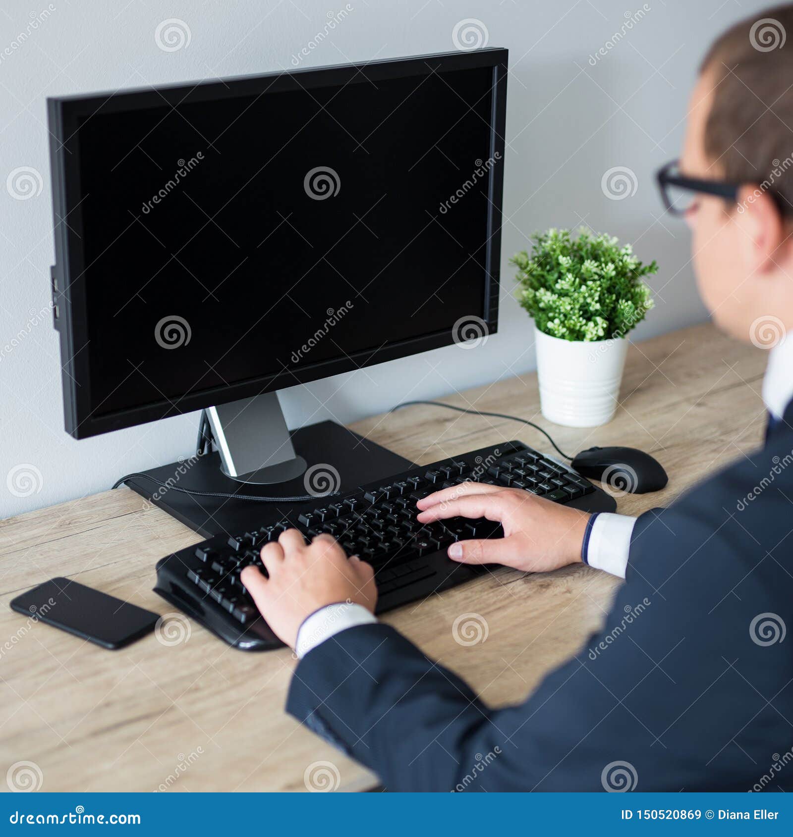 Back View of Business Man Using Computer in Office - Copy Space on ...