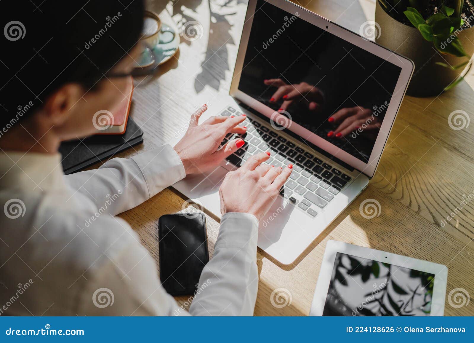 Back View of Businesslady Typing on Laptop in Office. Stock Photo ...