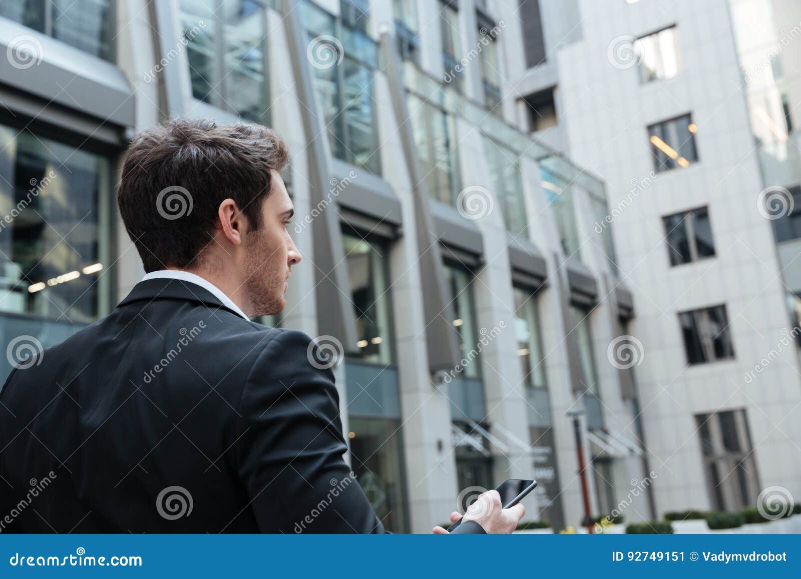 Back view of businessman stock image. Image of city, outside - 92749151