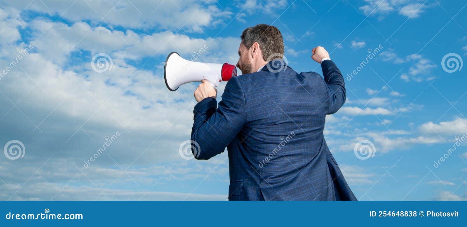 Back View of Businessman Shout in Loudspeaker on Sky Background ...