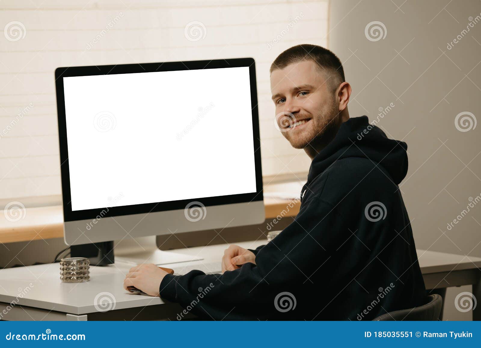 A Back View of a Businessman Works Remotely Using an All-in-one ...