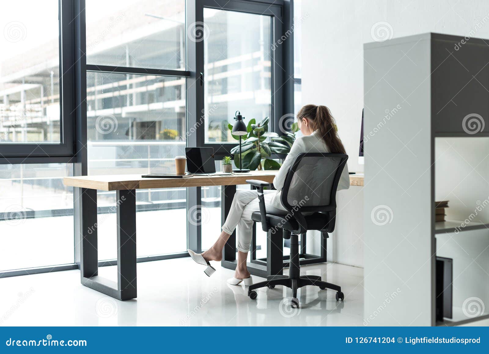 Back View of Businesswoman Sitting at Workplace Stock Photo - Image of ...