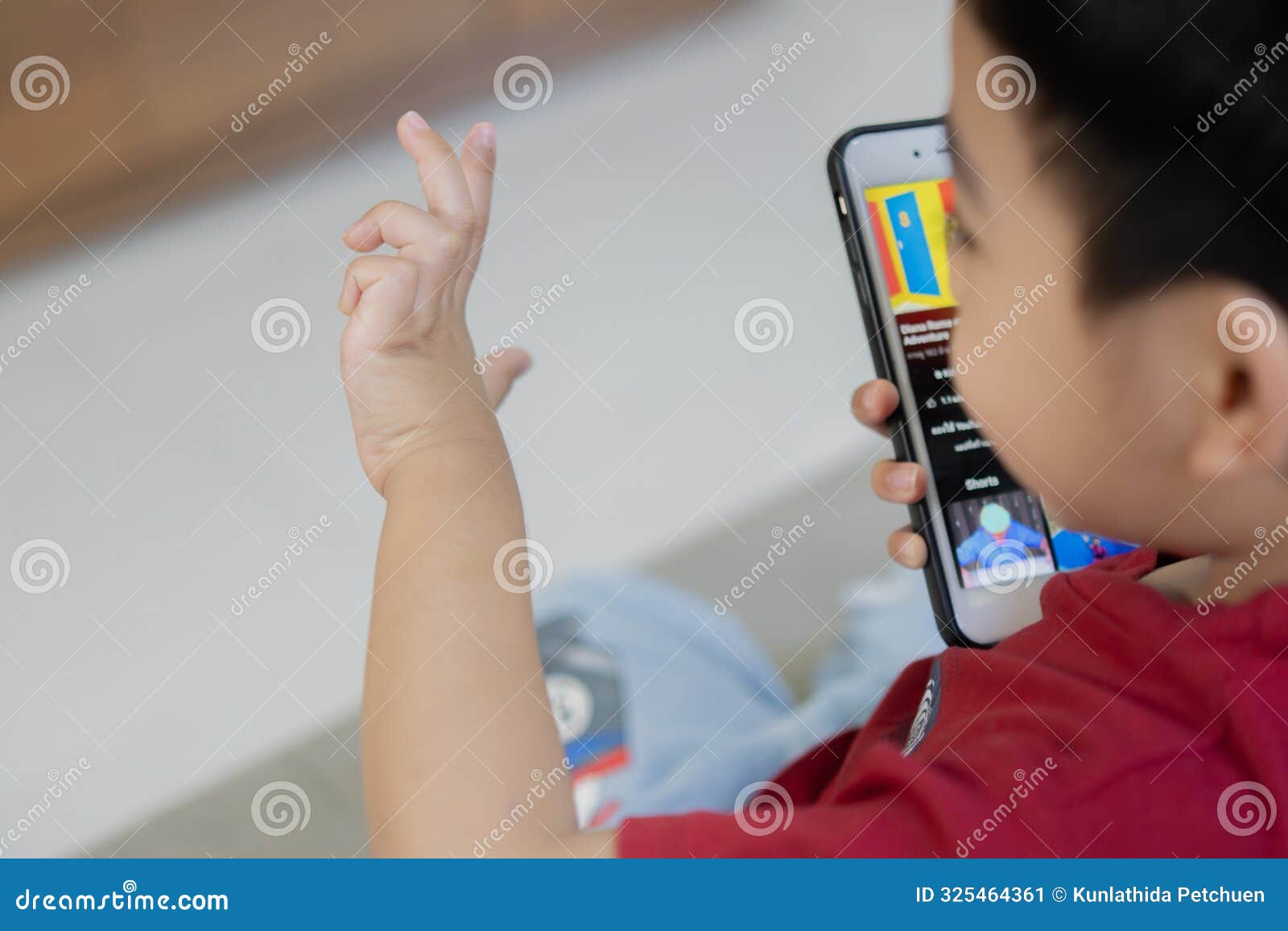 Back View of Child Boy Looking on Mobile Screen. Educational Online ...