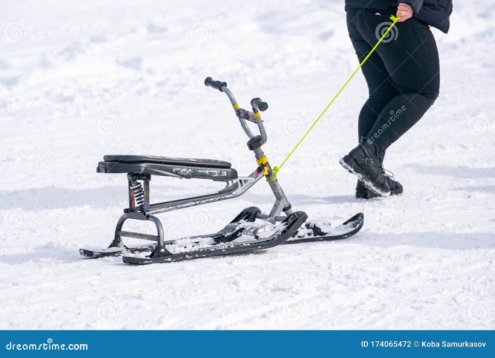 Back View of Child in Pulling Sledge and Running Up Snowy Slope Stock ...