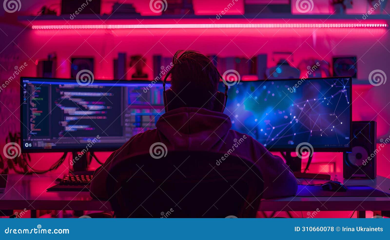 Programmer Immersed in Coding at Night in a Neon-lit Workspace ...
