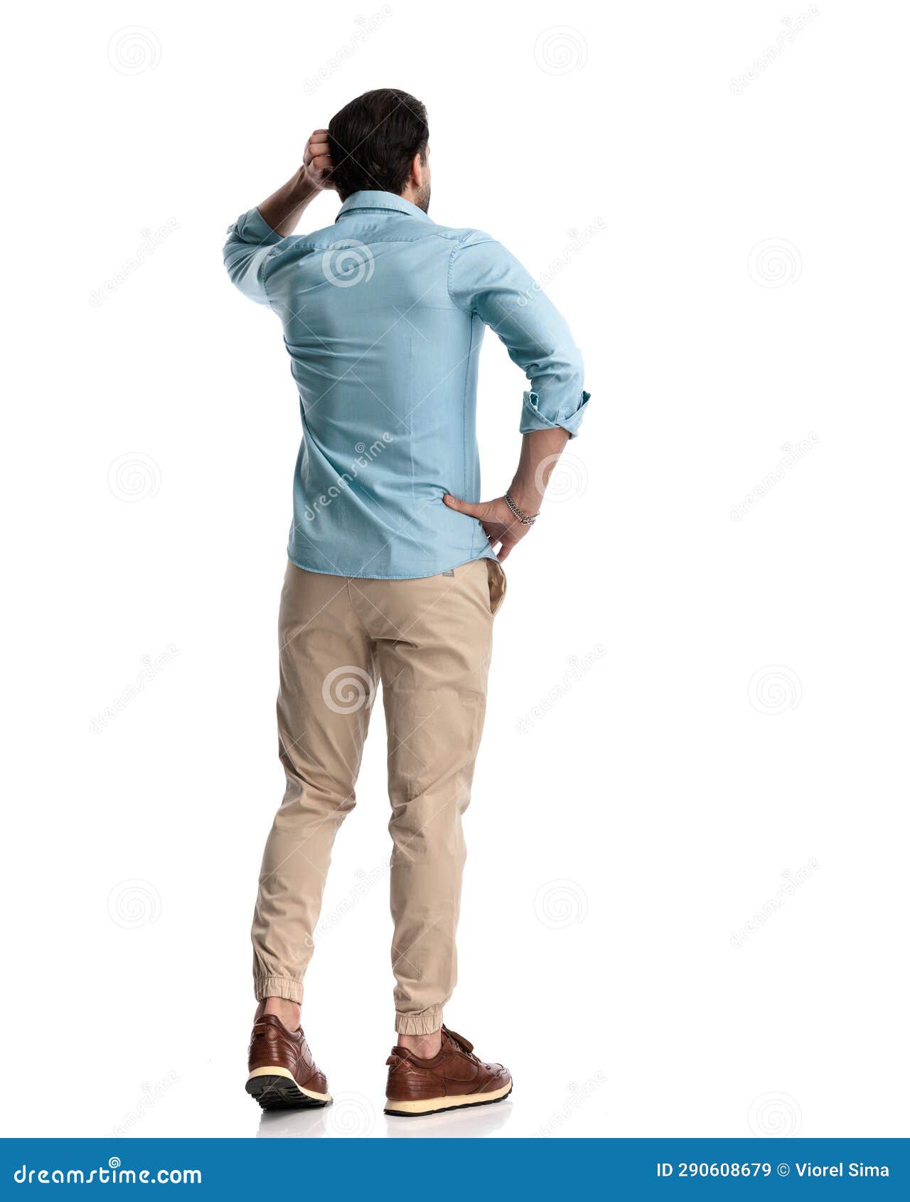 Back View of Confused Young Man Scratching Head and Thinking Stock ...